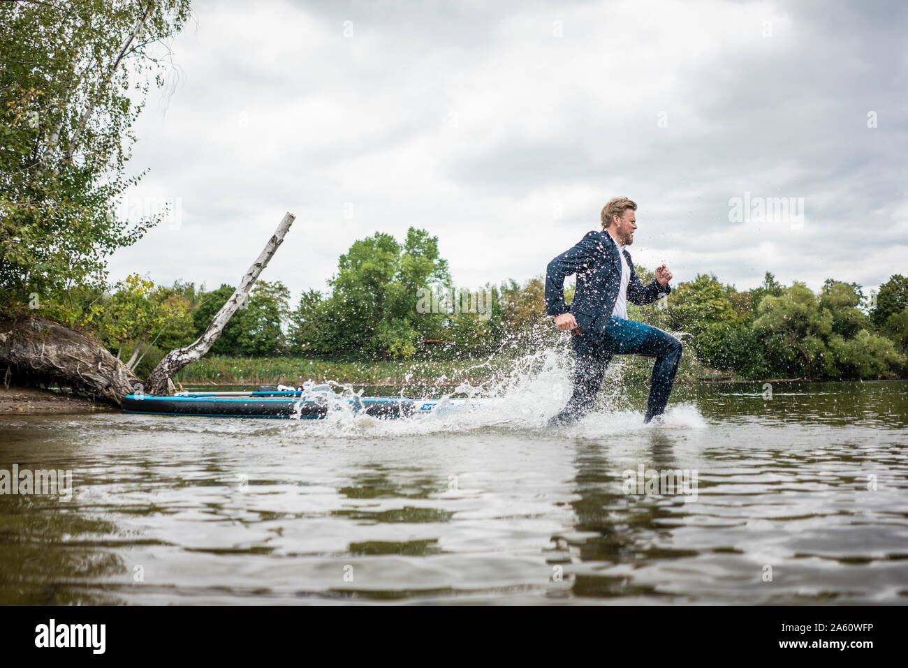 Running into a lake hi-res stock photography and images - Alamy