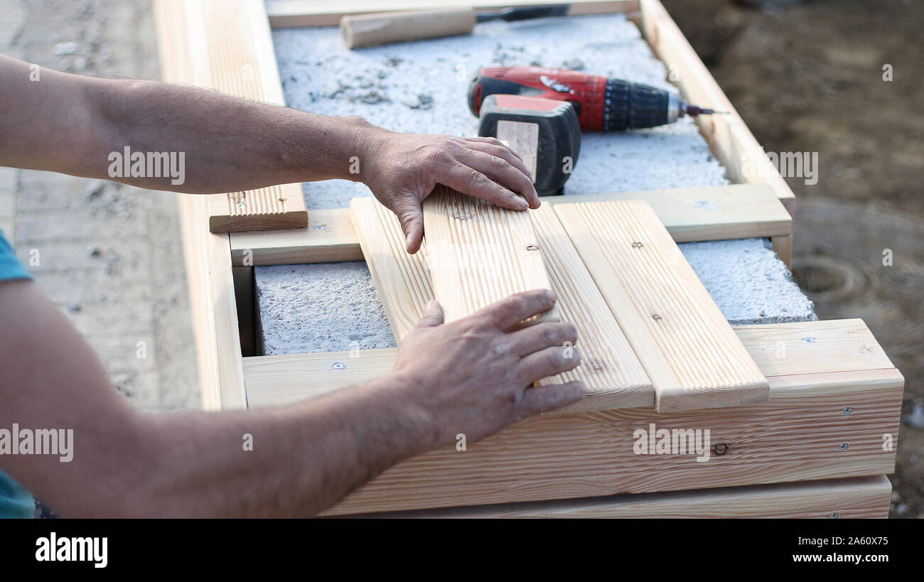 Construction Worker with Drill tools ( repair, wood Stock Photo - Alamy
