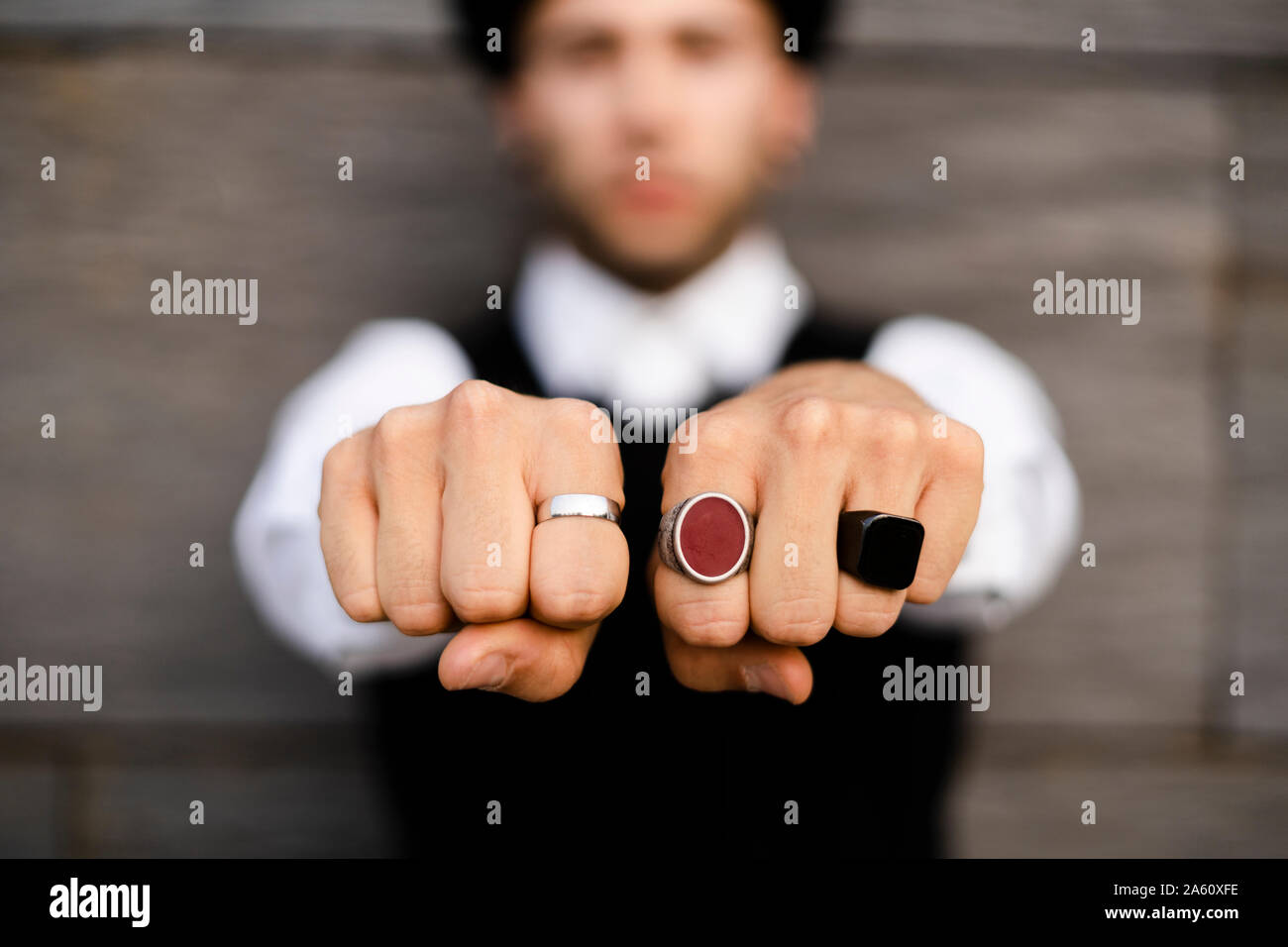 Mans hands with three various rings hi-res stock photography and images ...
