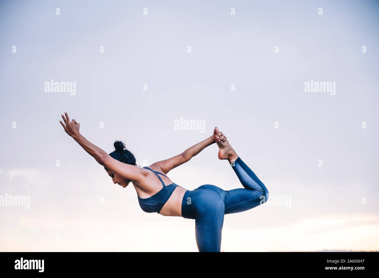Yoga position standing hi-res stock photography and images - Alamy