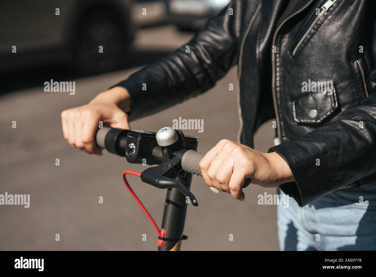 Hands on handlebar of scooter hi-res stock photography and images - Alamy
