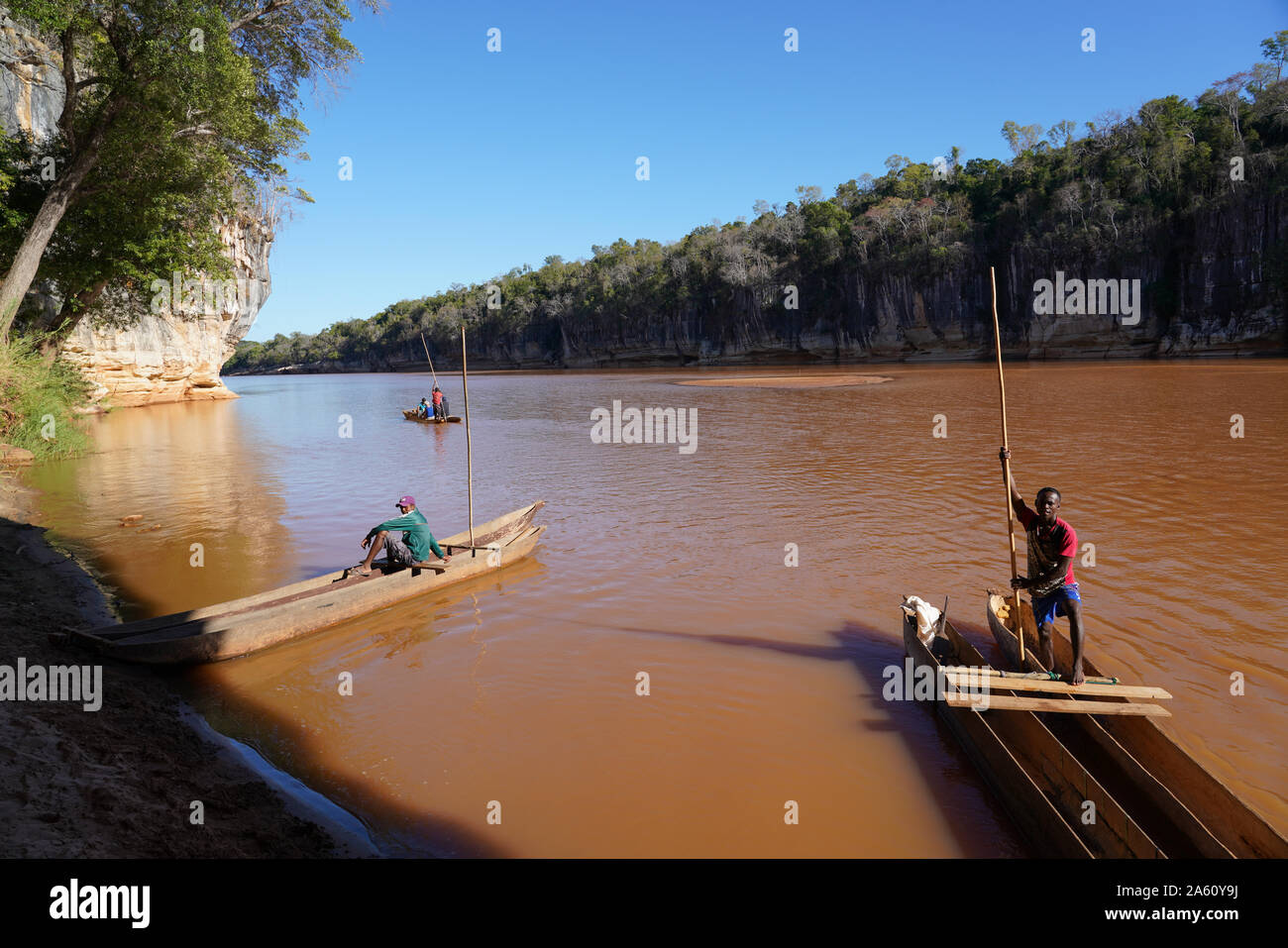 Pirogue excursion along Manambolo river crossing Tsingy de Bemaraha ...