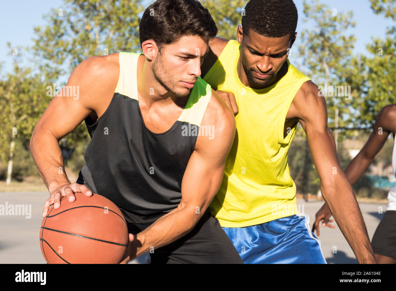 Young men playing ball hi-res stock photography and images - Alamy