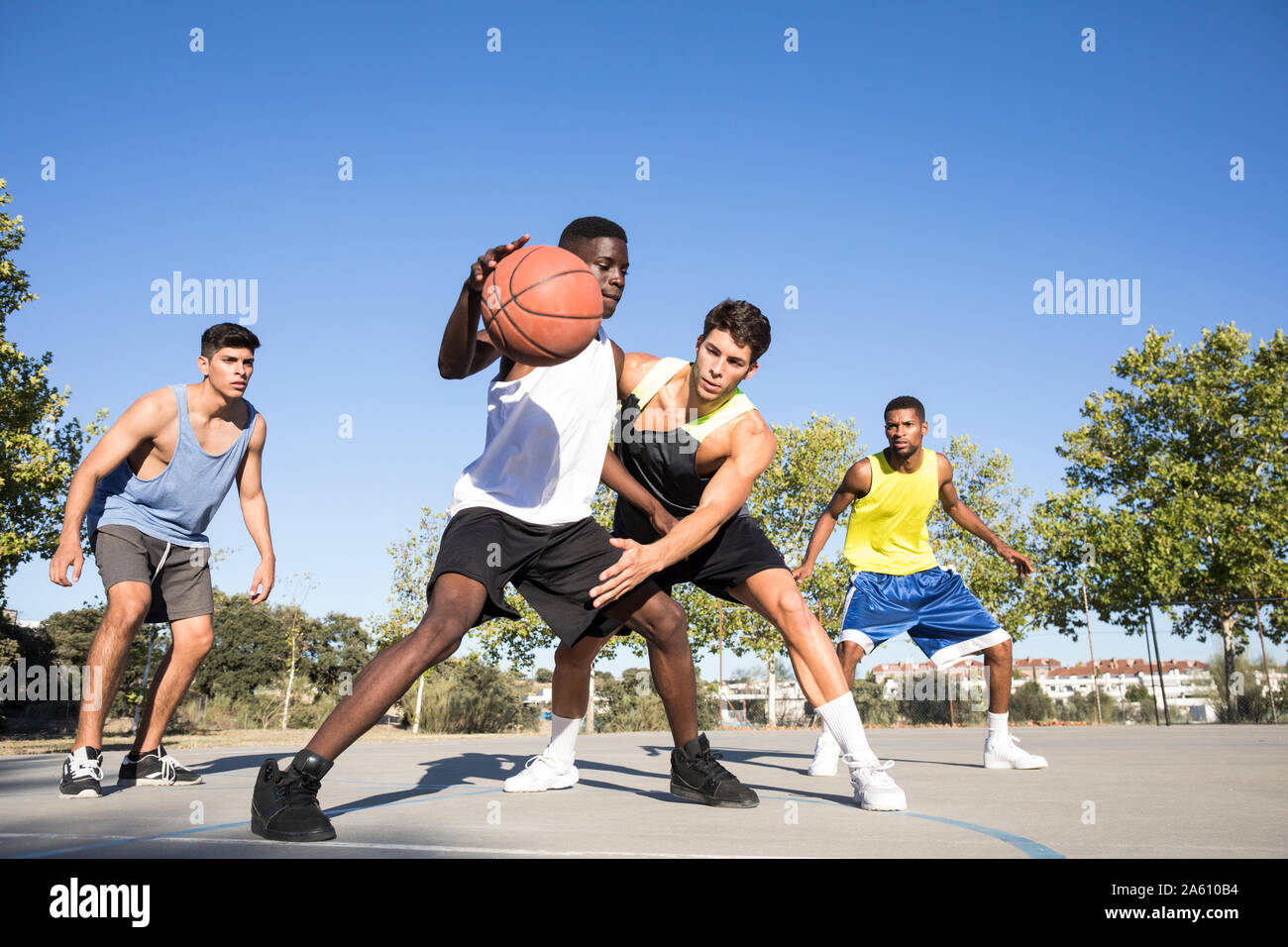 Young men playing ball hi-res stock photography and images - Alamy