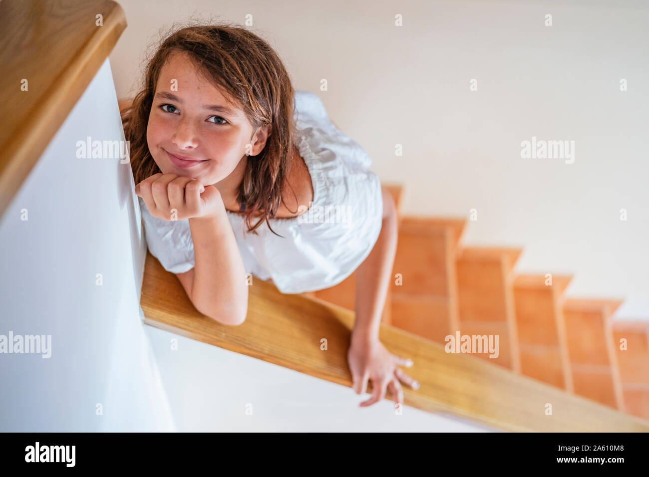 Children on staircase hi-res stock photography and images - Alamy