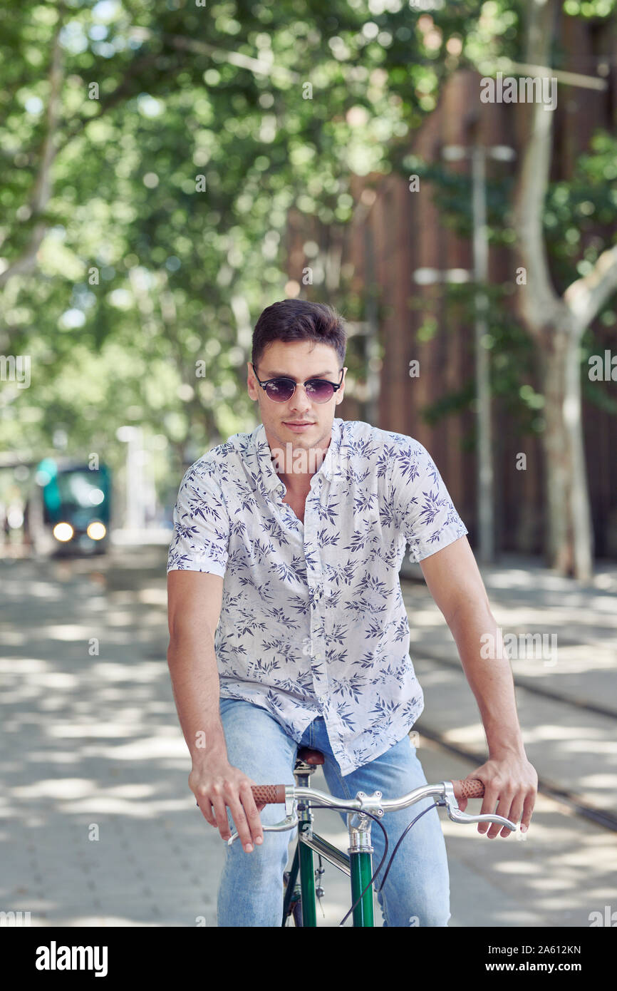 Man riding bicycle hi-res stock photography and images - Alamy