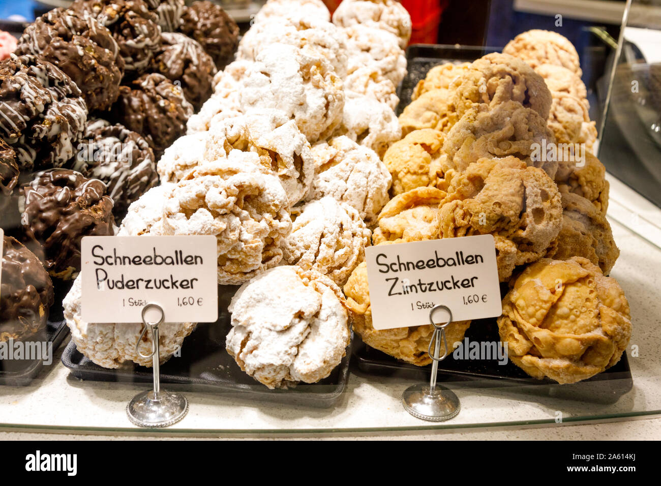 Schneeball or Schneeballen (snowball) pastry with powdered sugar ...
