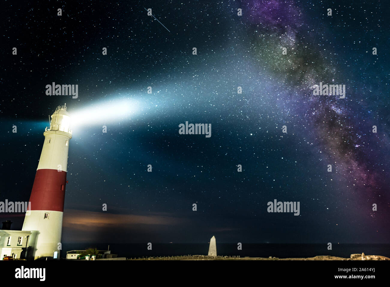 Lighthouse light beam portland bill hi-res stock photography and images ...