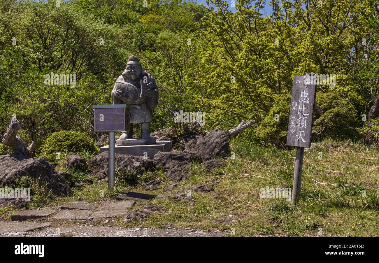 Buddha Statue Number 5 with explanation sign of the Buddha Path on the ...