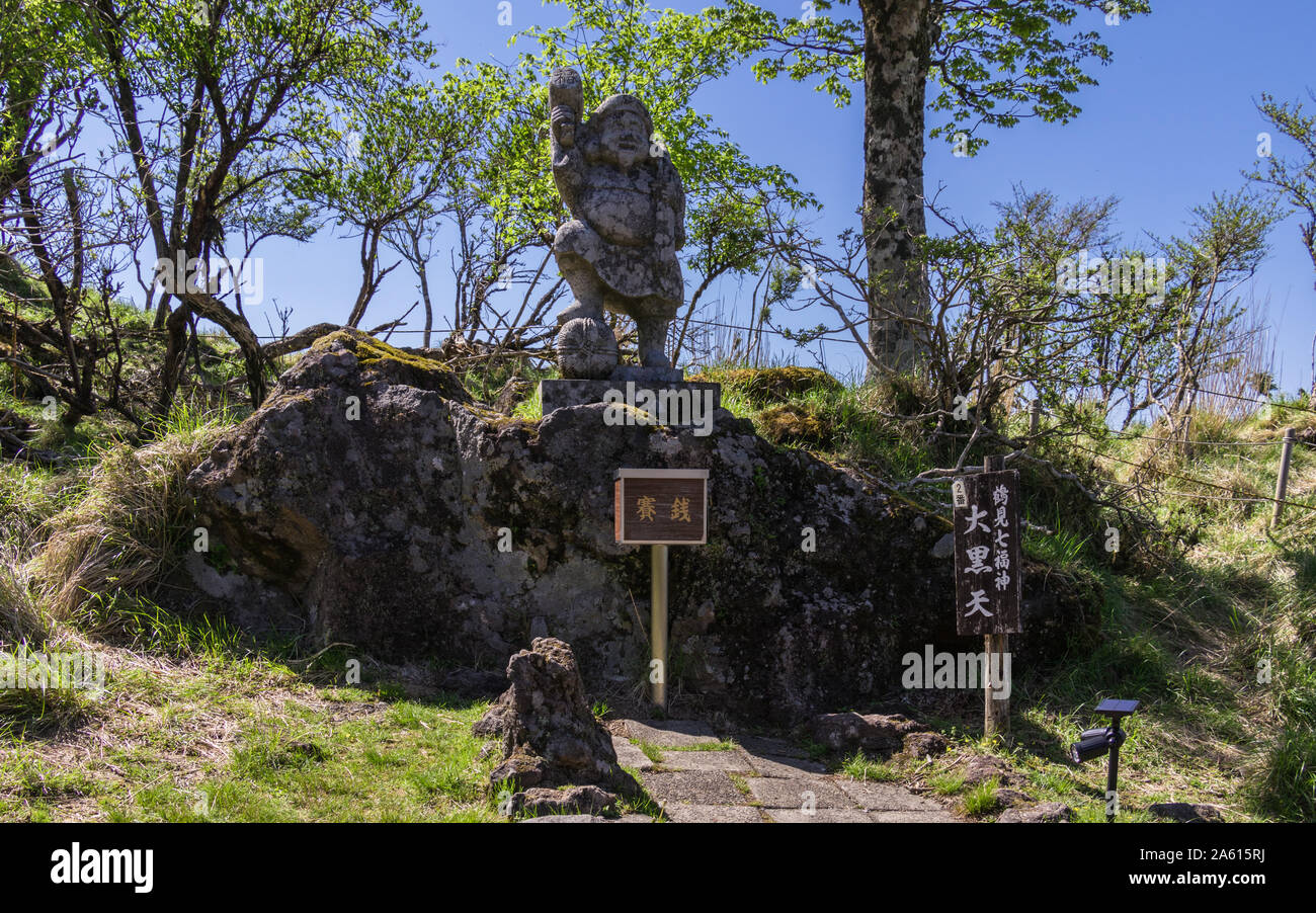 Buddha Statue Number 2 with explanation sign of the Buddha Path on the ...