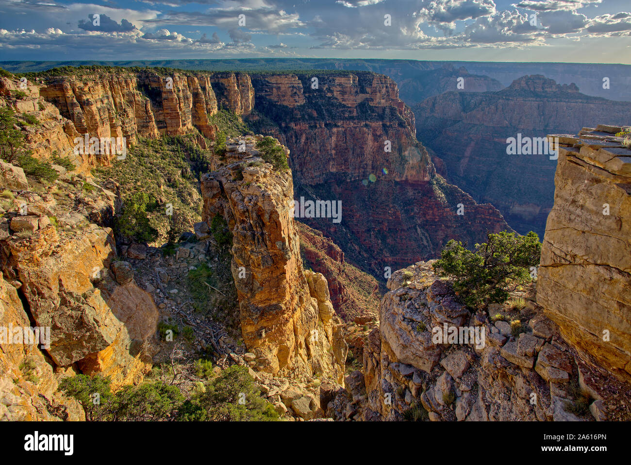 Pillars of rock standing just away from the cliff of the Grand Canyon ...