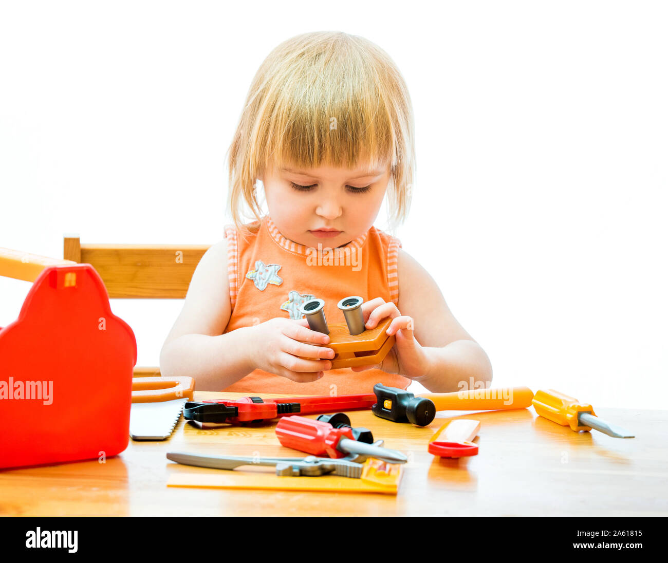 cute little kid with toy tools isolated on a white background Stock ...