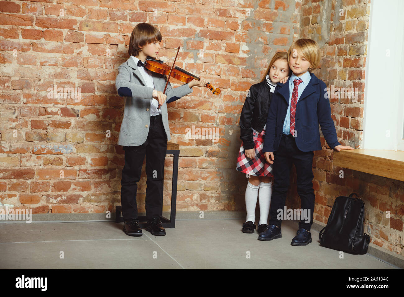 Group of kids spending time after school together. Handsome friends ...