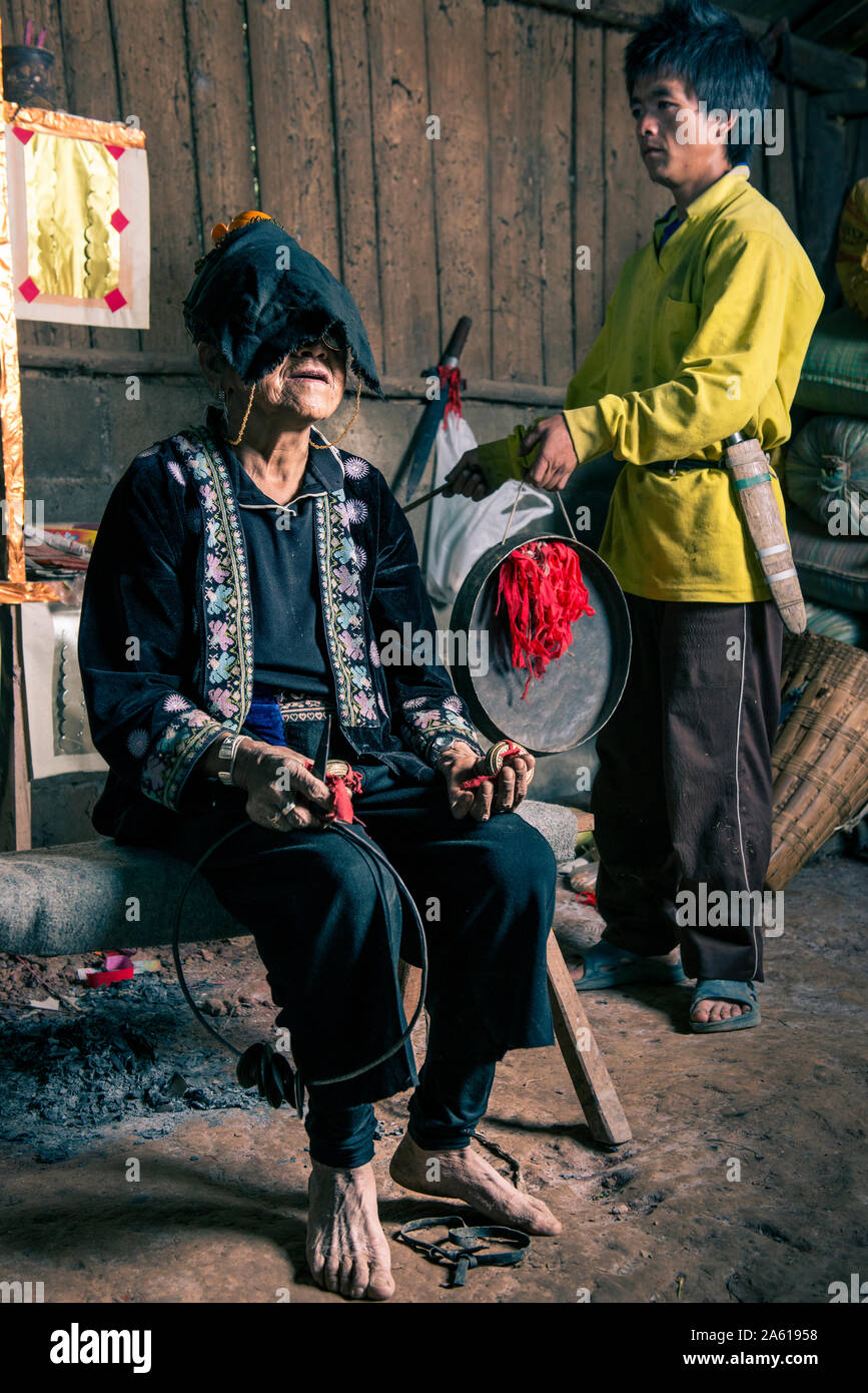 Hmong shaman performing a ritual in Khun Sathan, Nan, Thailand Stock ...