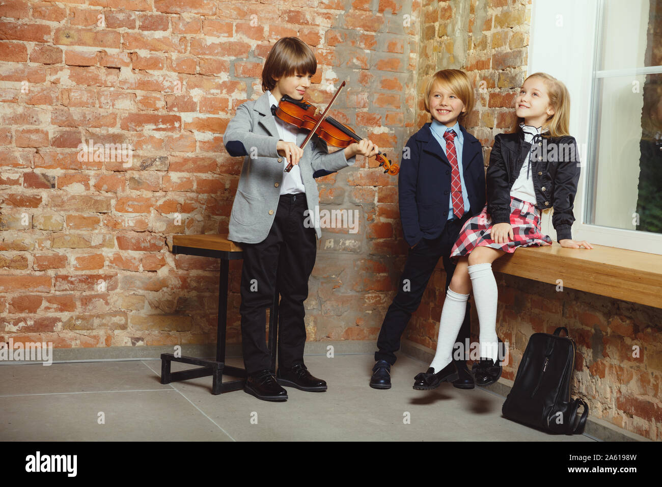 Group of kids spending time after school together. Handsome friends ...