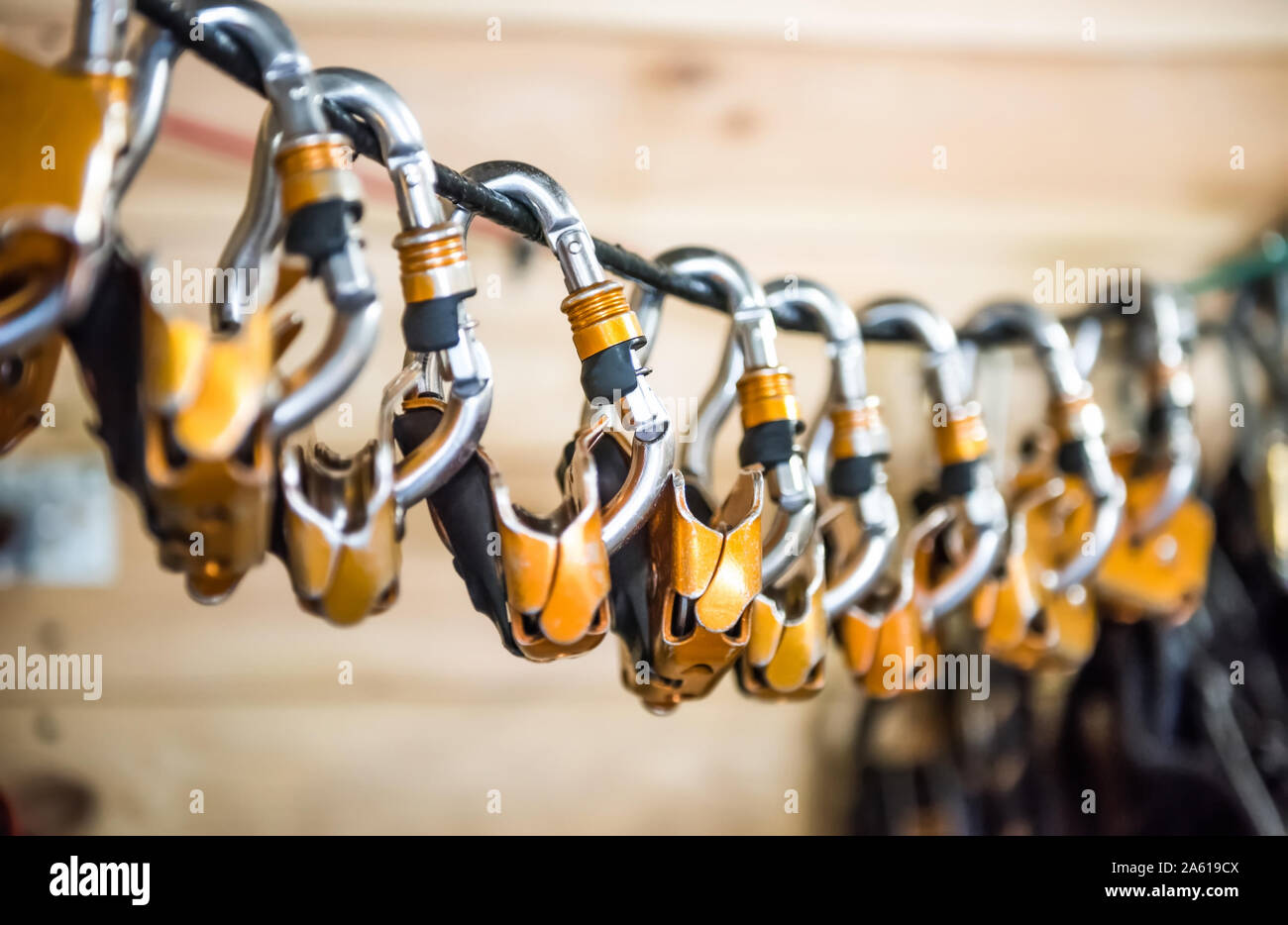 carabiners for climbers hung on a rope closeup Stock Photo - Alamy