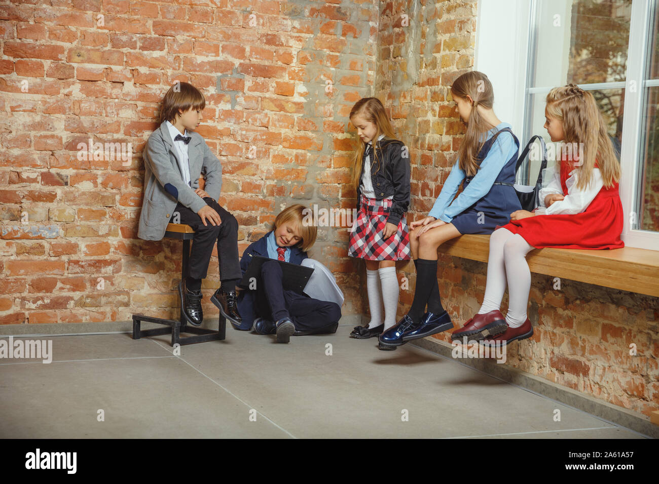 Group of kids spending time after school together. Handsome friends ...