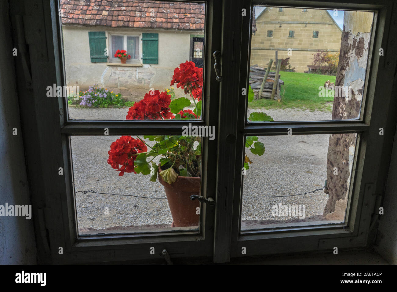 German house with geraniums hi-res stock photography and images - Alamy