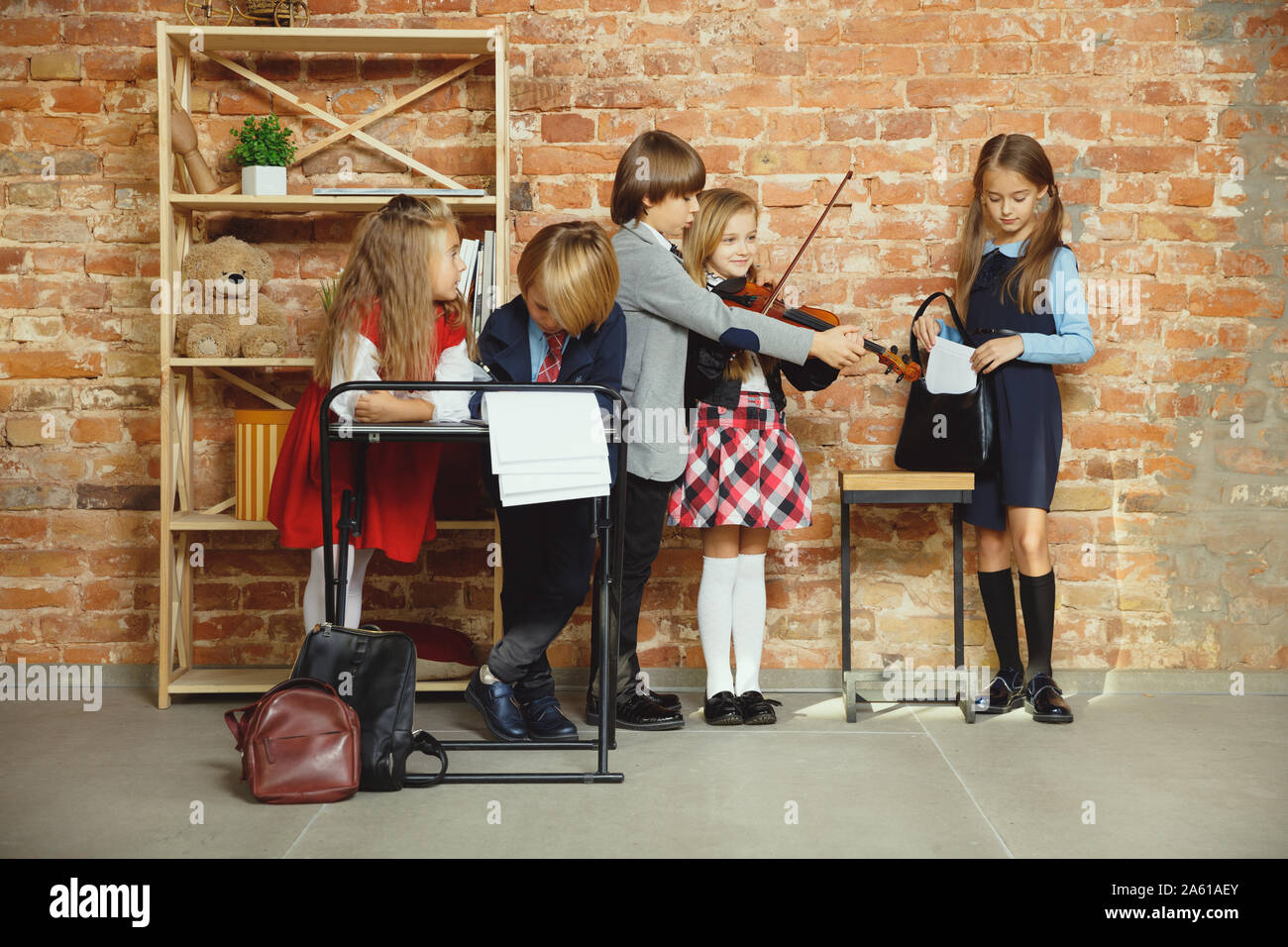 Group of kids spending time after school together. Handsome friends ...
