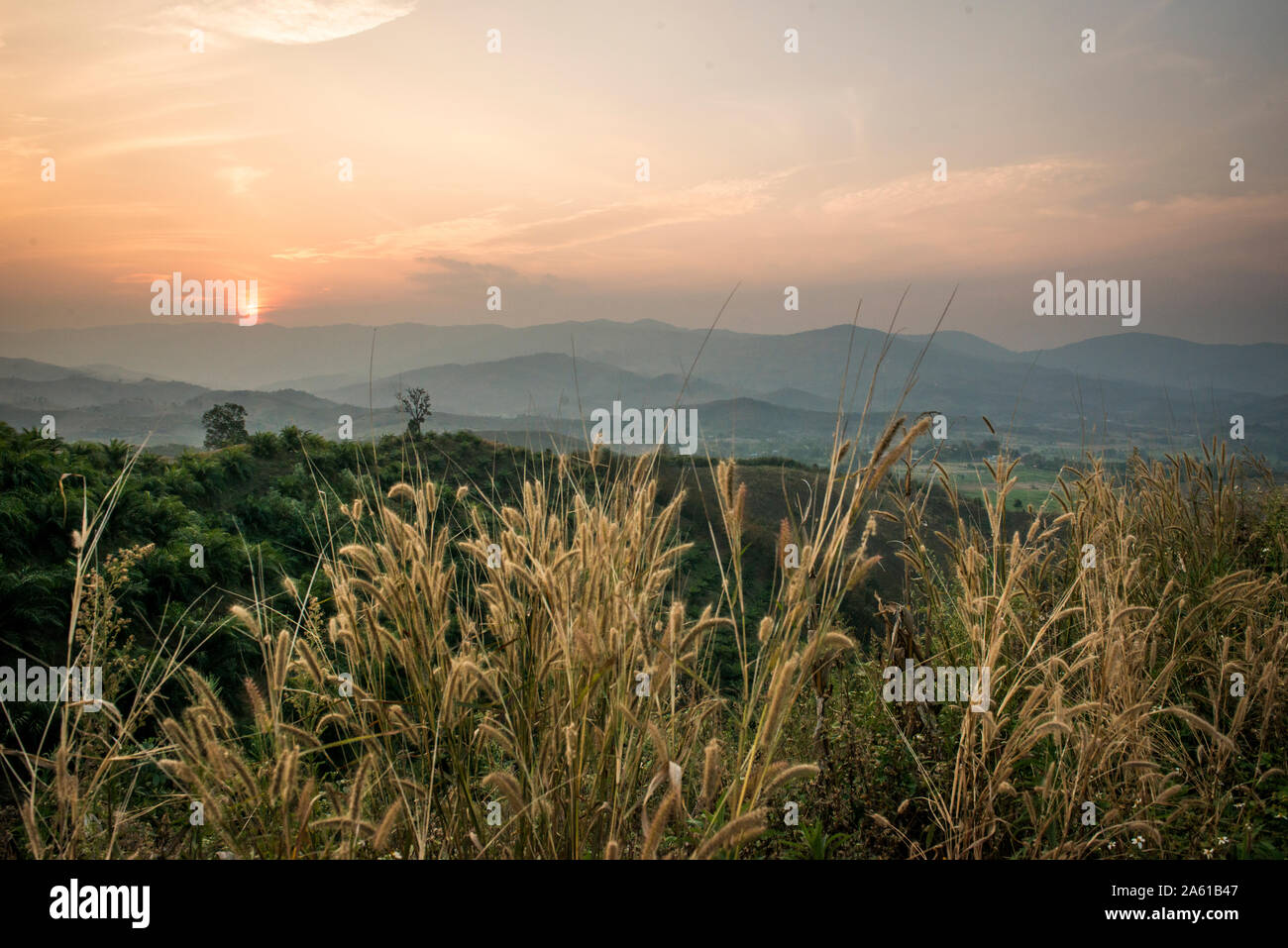 A serene view of the Hmong village of Khun Sathan nestled in the lush ...