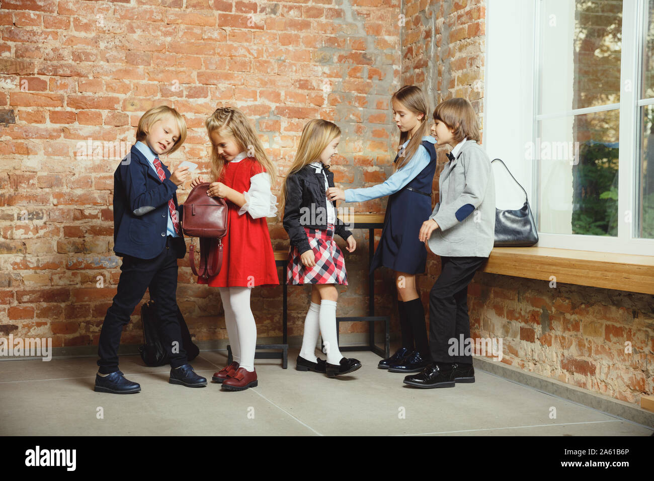 Group of kids spending time after school together. Handsome friends ...