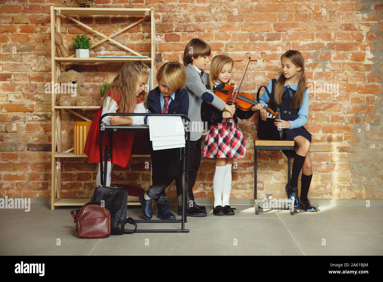Group of kids spending time after school together. Handsome friends ...