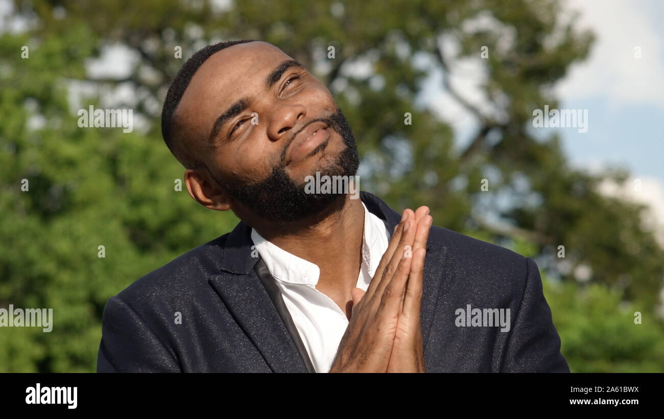 Handsome Male Praying Stock Photo - Alamy