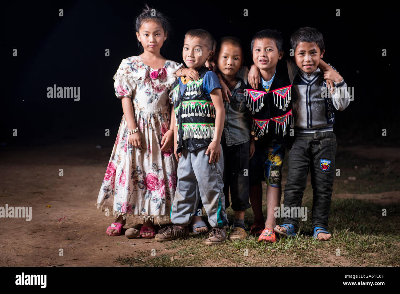 Hmong children pose proudly during New Year festivities in Muang Sing ...