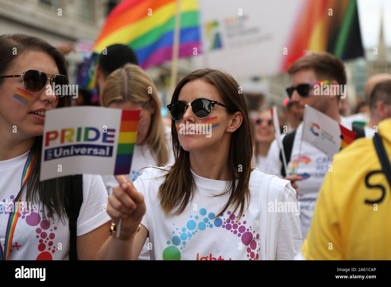 Participants with pride colour face paint during the parade.The 50th ...