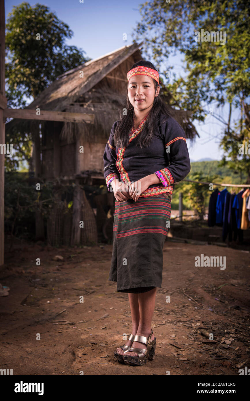 Khmu girls in traditional attire proudly pose in a rural village in ...