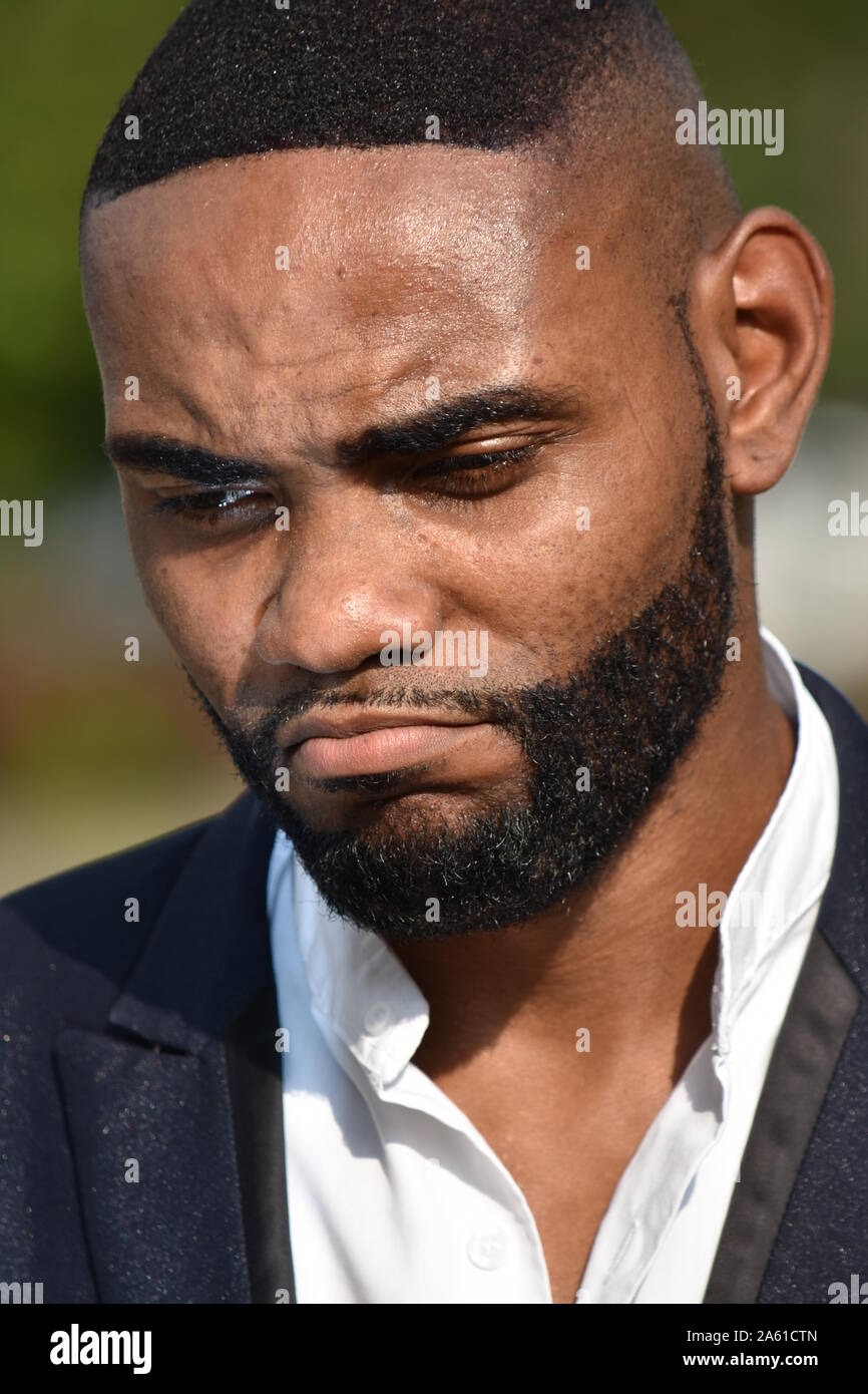 An Unhappy Handsome Male Man Stock Photo - Alamy