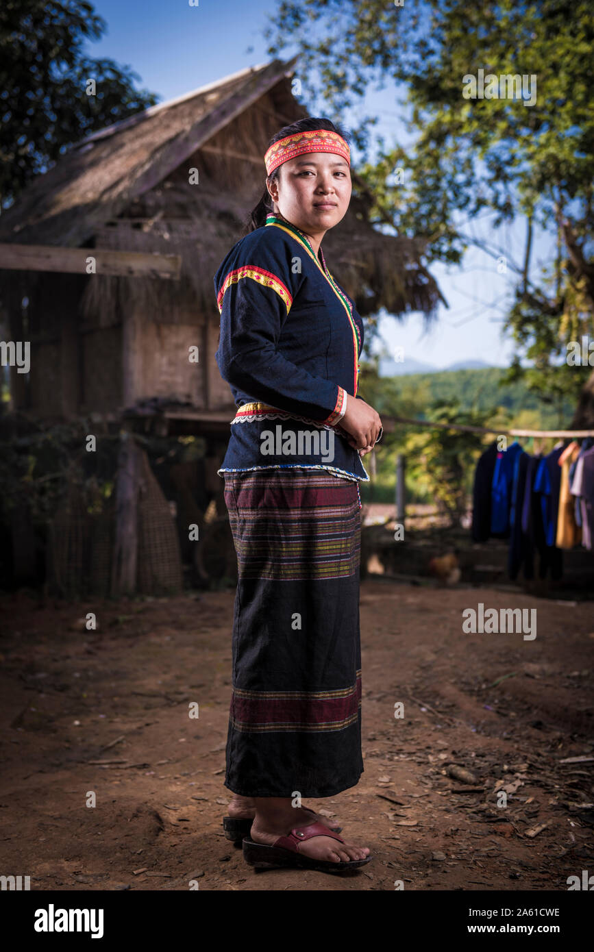 Khmu girls in traditional attire proudly pose in a rural village in ...