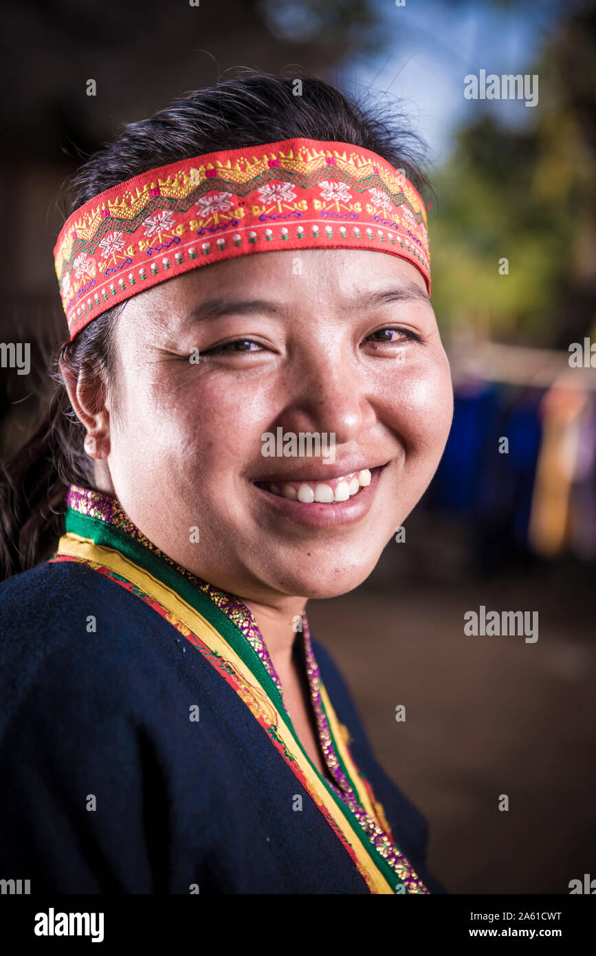Khmu girls in traditional attire proudly pose in a rural village in ...