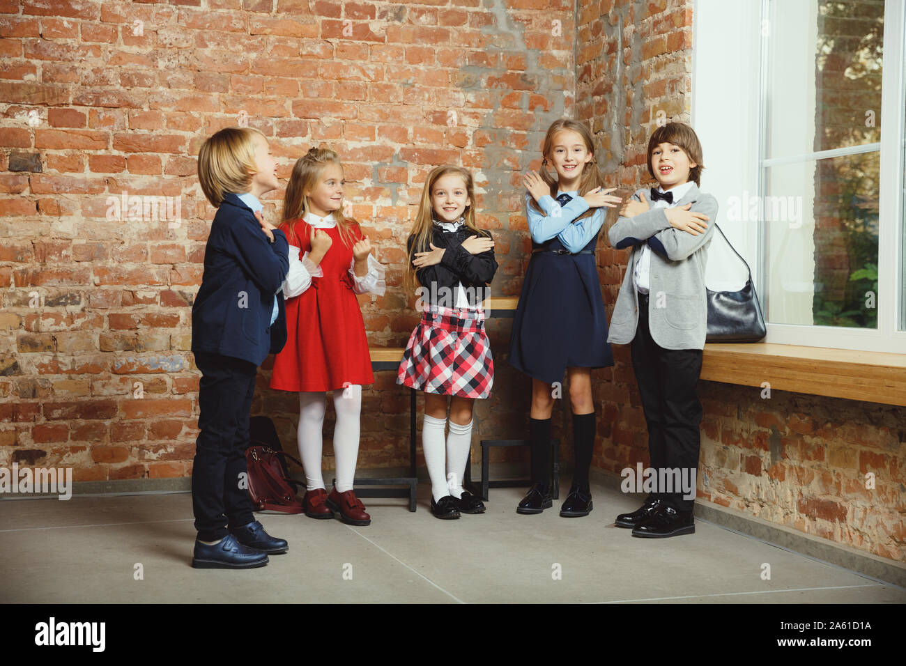 Group of kids spending time after school together. Handsome friends ...