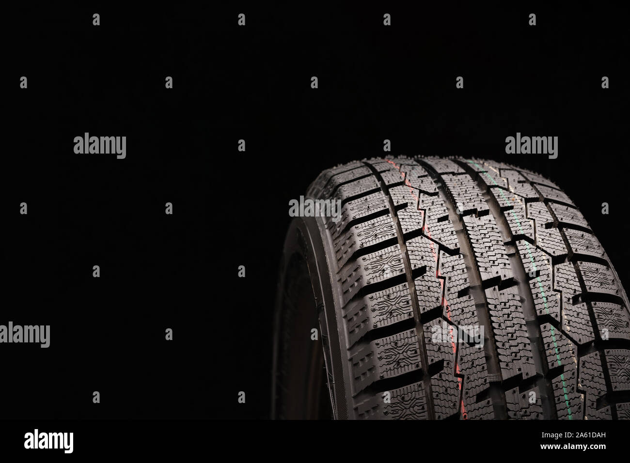 winter friction tire Velcro without spikes close-up on black background ...