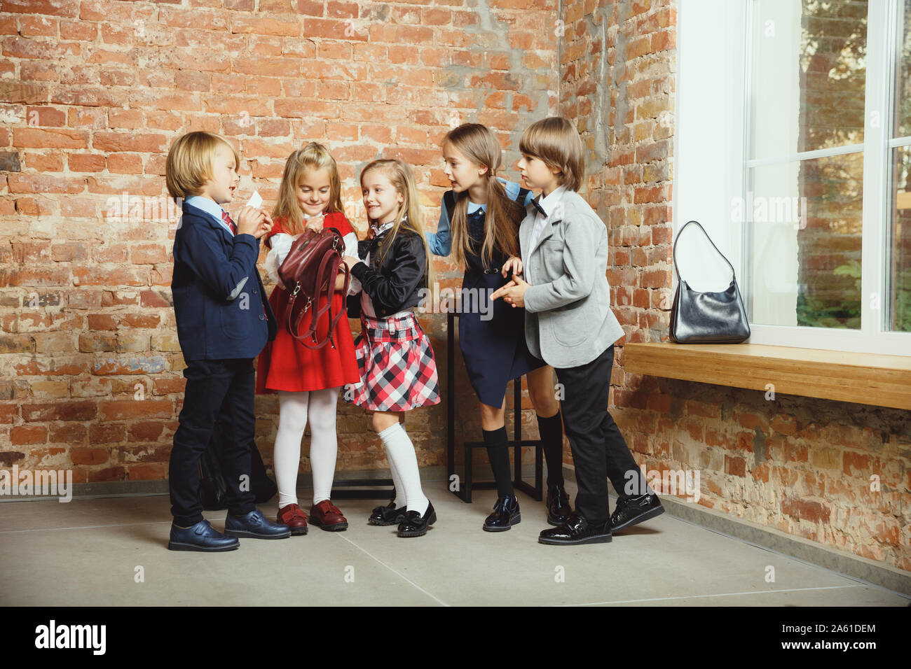 Group of kids spending time after school together. Handsome friends ...