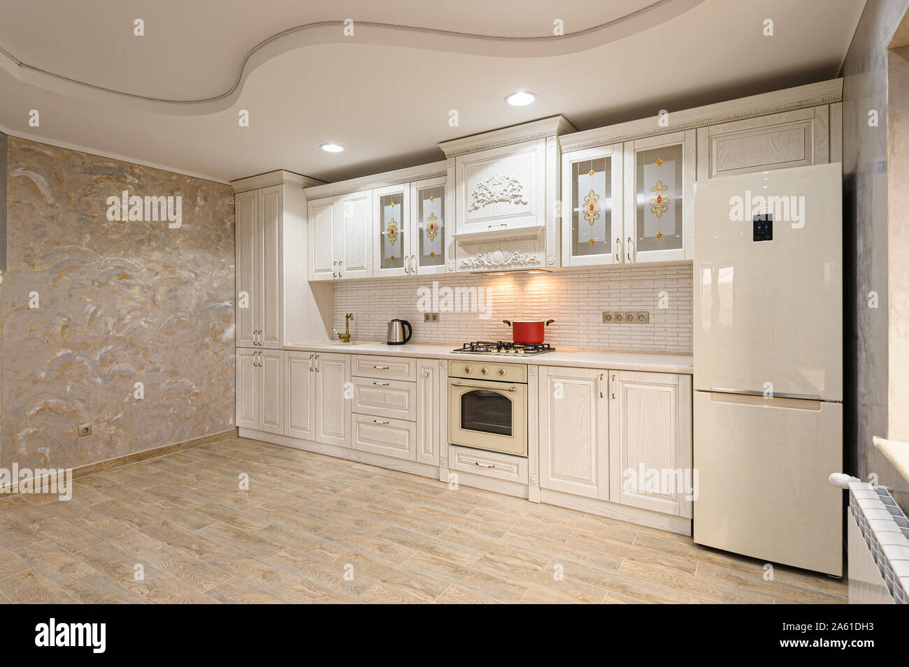 Luxury modern white and beige kitchen interior Stock Photo - Alamy