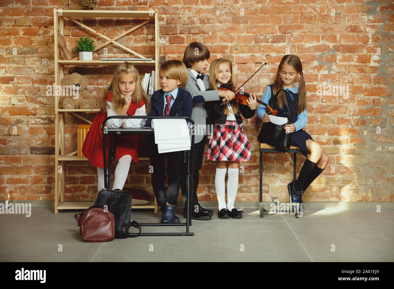 Group of kids spending time after school together. Handsome friends ...