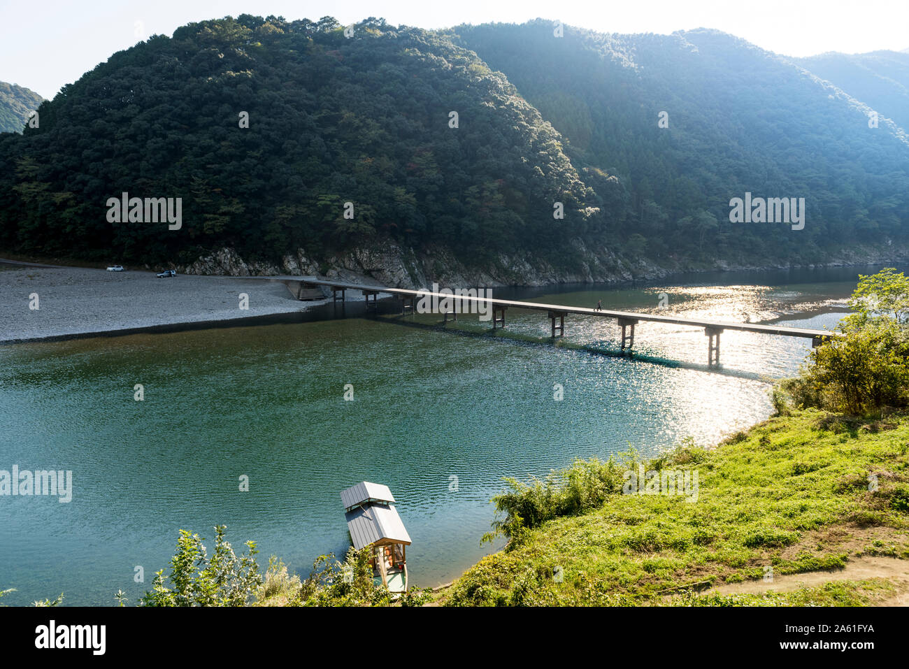 A serene view of the Shimanto River in Shikoku, Japan, where a simple ...