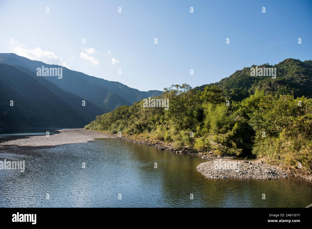 A serene view of the Shimanto River in Shikoku, Japan, where a simple ...