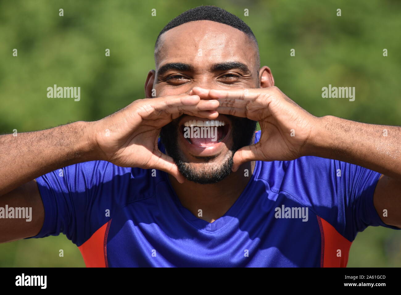 Male Athlete Yelling Stock Photo - Alamy