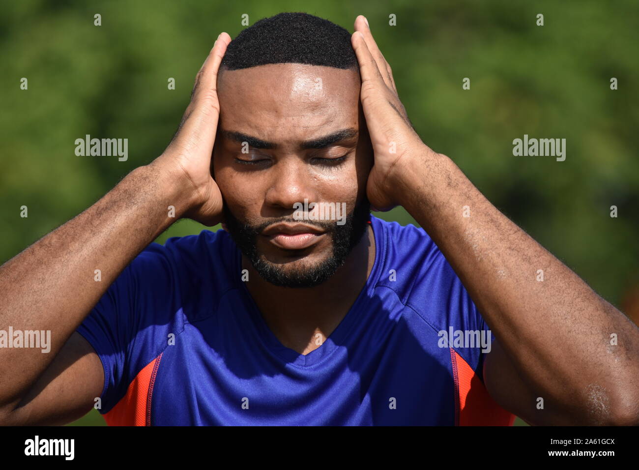 Quiet Male Athlete Stock Photo - Alamy