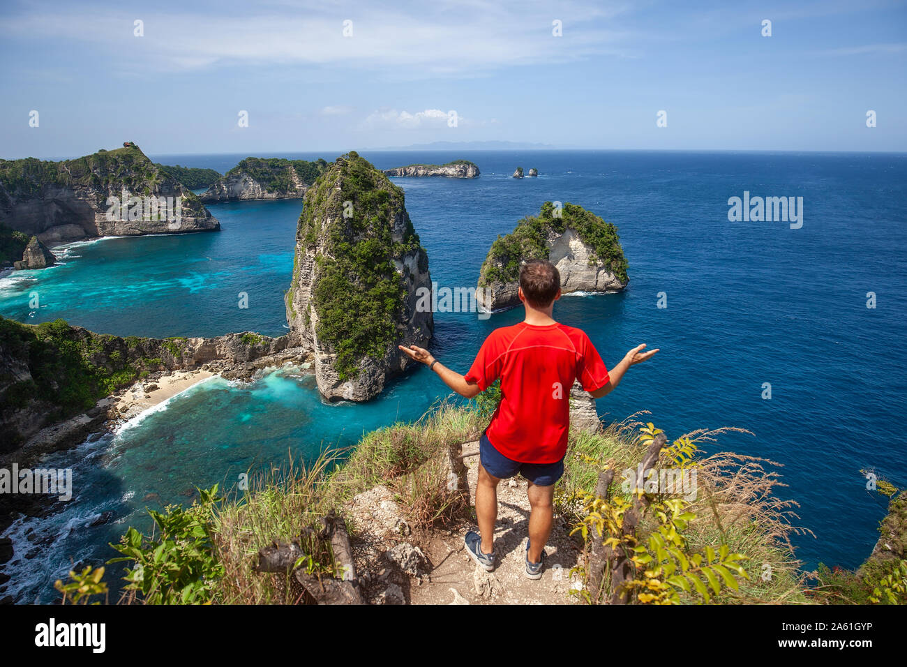 Happy man gesture raised arms on the rock Thousand Island Viewpoint ...
