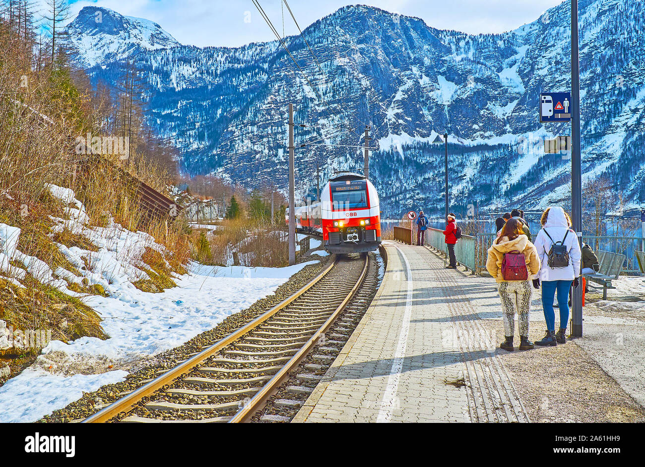 HALLSTATT, AUSTRIA - FEBRUARY 21, 2019: The modern train arrives to ...