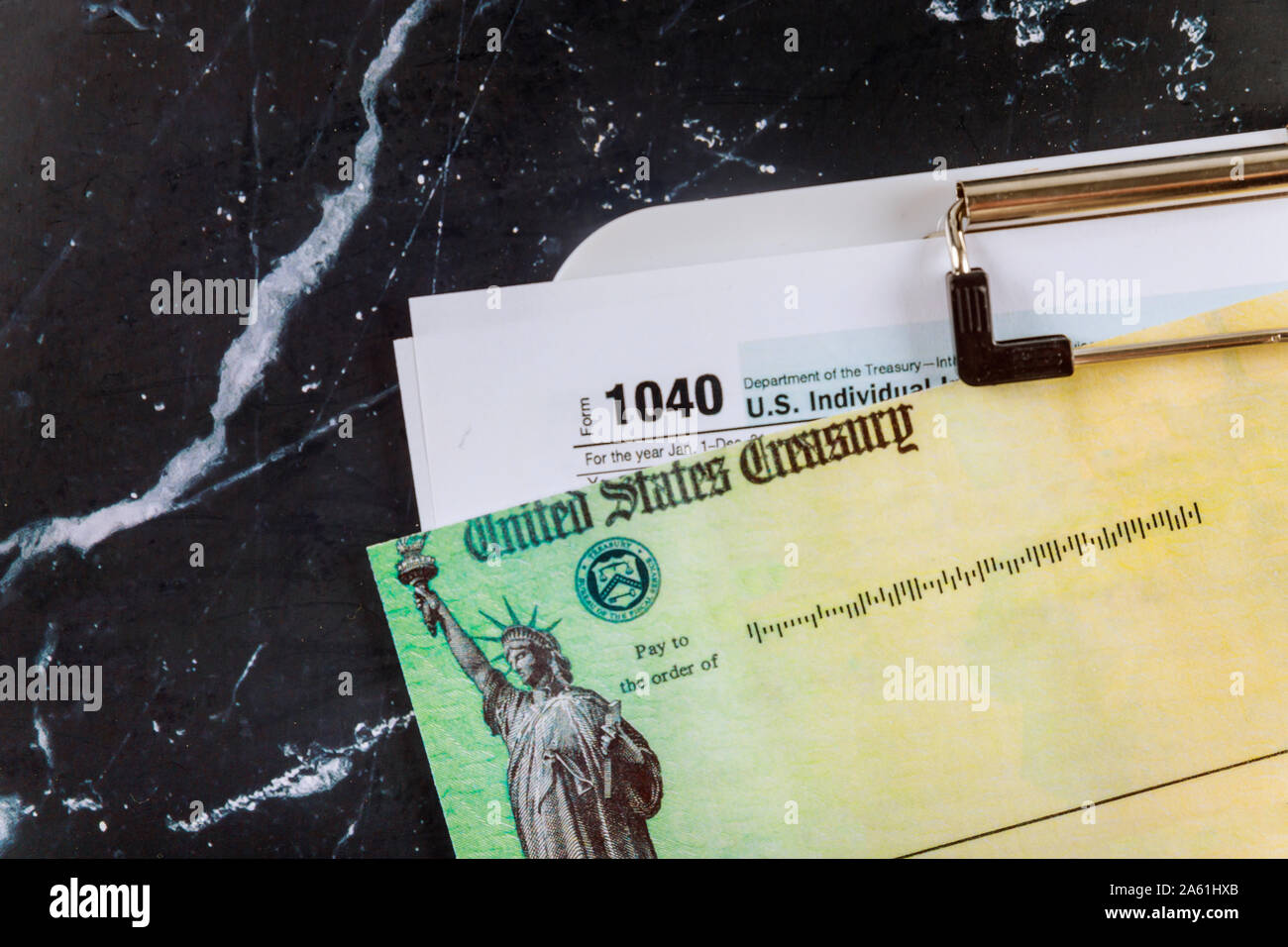 1040 Tax Form with Refund Check and bills US stimulus refund check ...