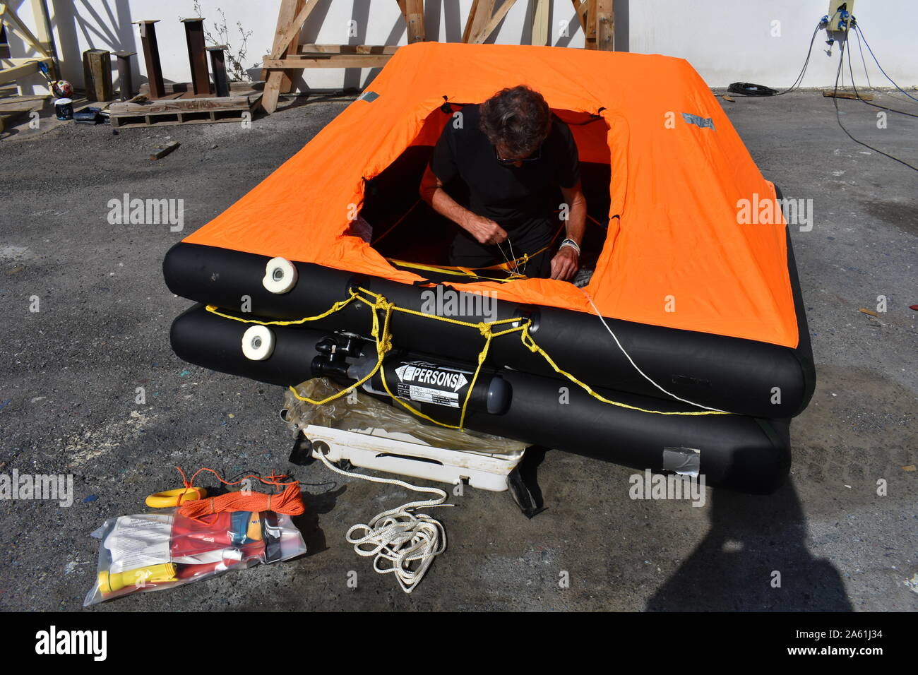Liferaft man hi-res stock photography and images - Alamy