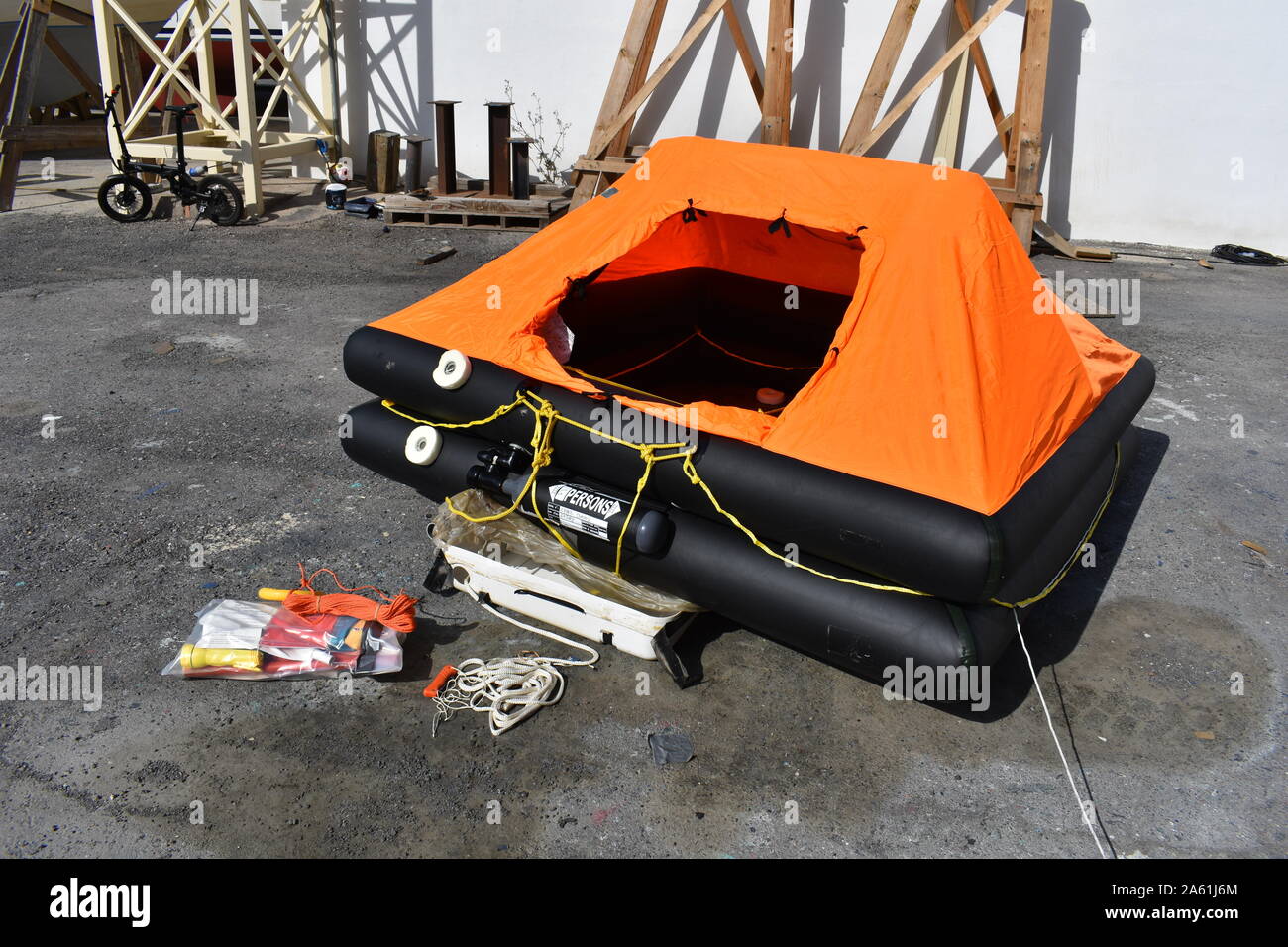 Inflated life raft on land Stock Photo - Alamy