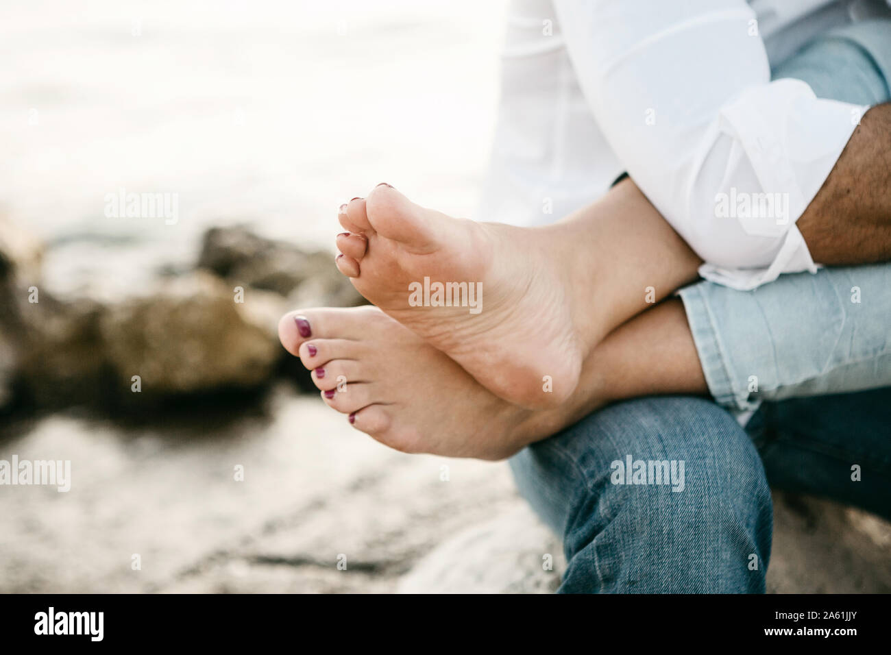 Hugging legs hi-res stock photography and images - Alamy