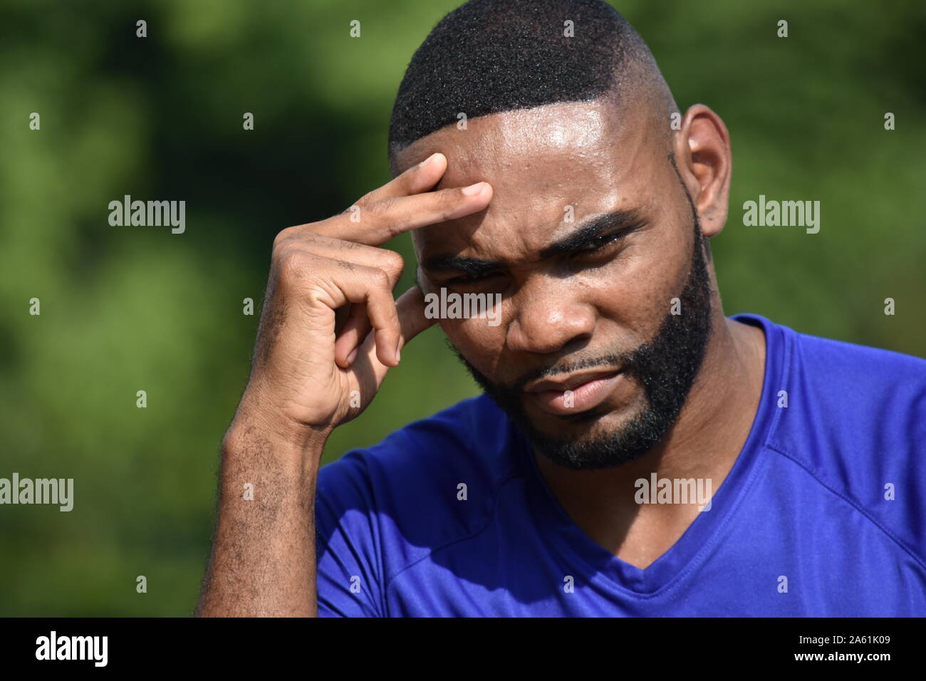Fit Male Athlete Thinking Stock Photo - Alamy