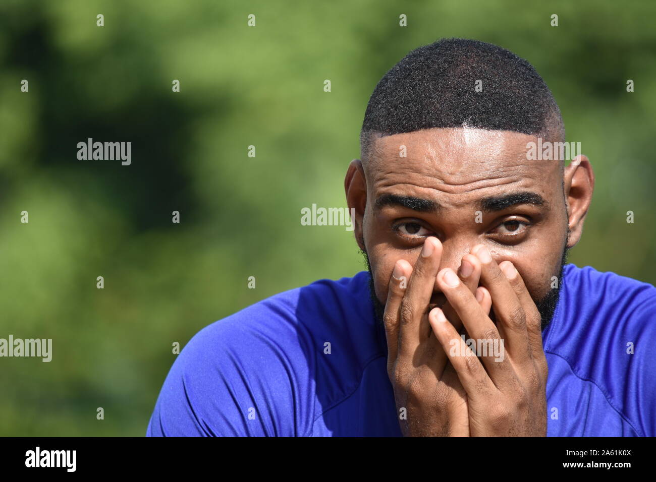 Fearful Male Athlete Stock Photo - Alamy